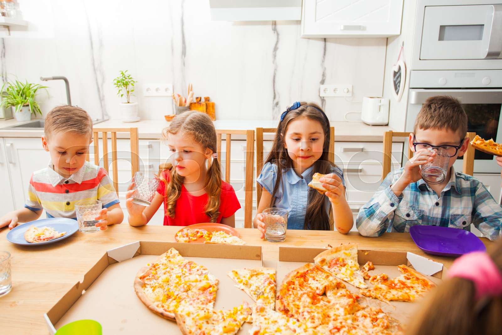 Children eating, table in scandinavian kitchen interiour. | Stock image ...