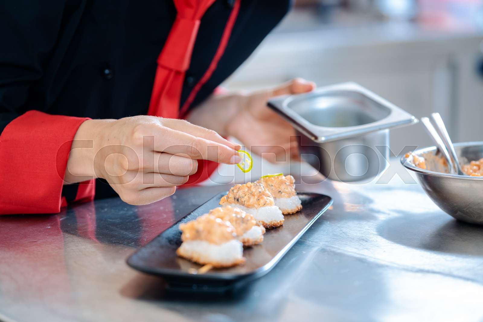 Chef plating finished appetizer | Stock image | Colourbox