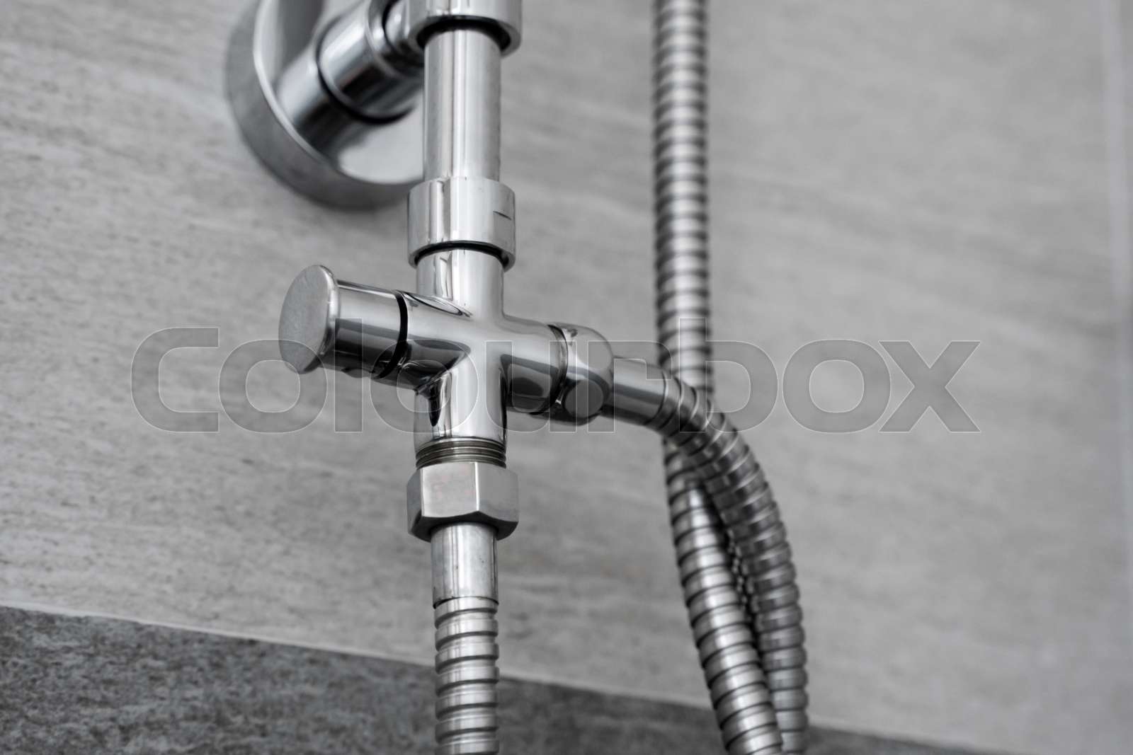 Chrome pipes and shower mounts in the modern bathroom. | Stock image ...