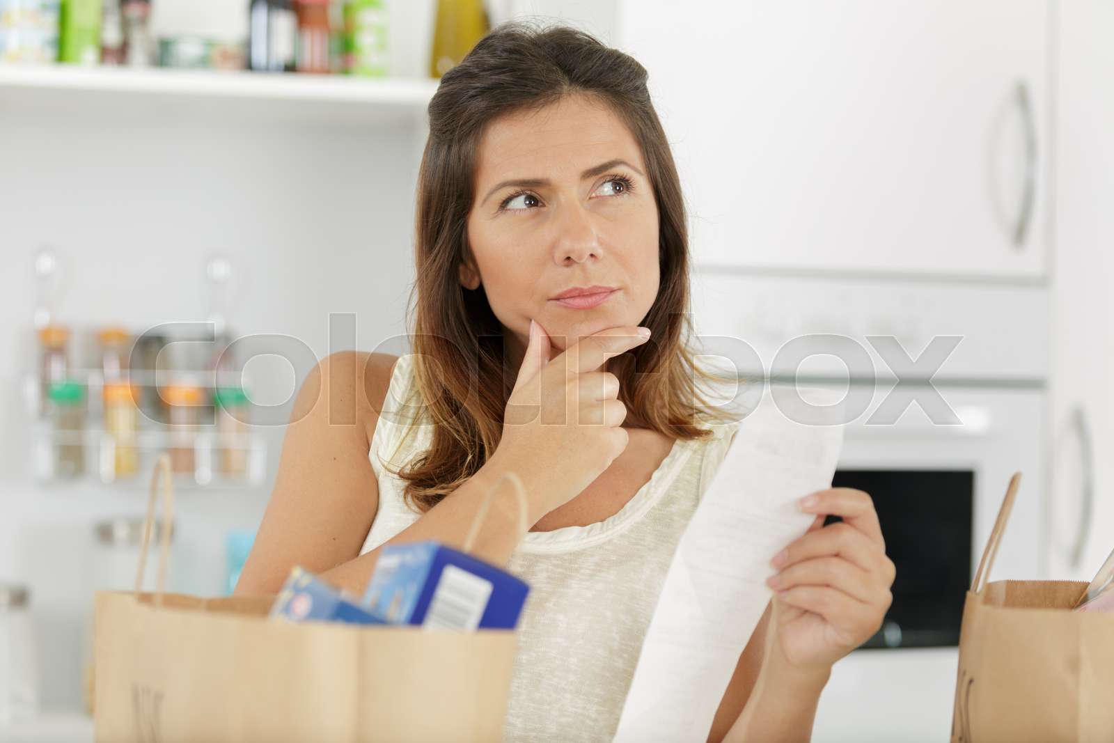 a woman forgot buying something | Stock image | Colourbox