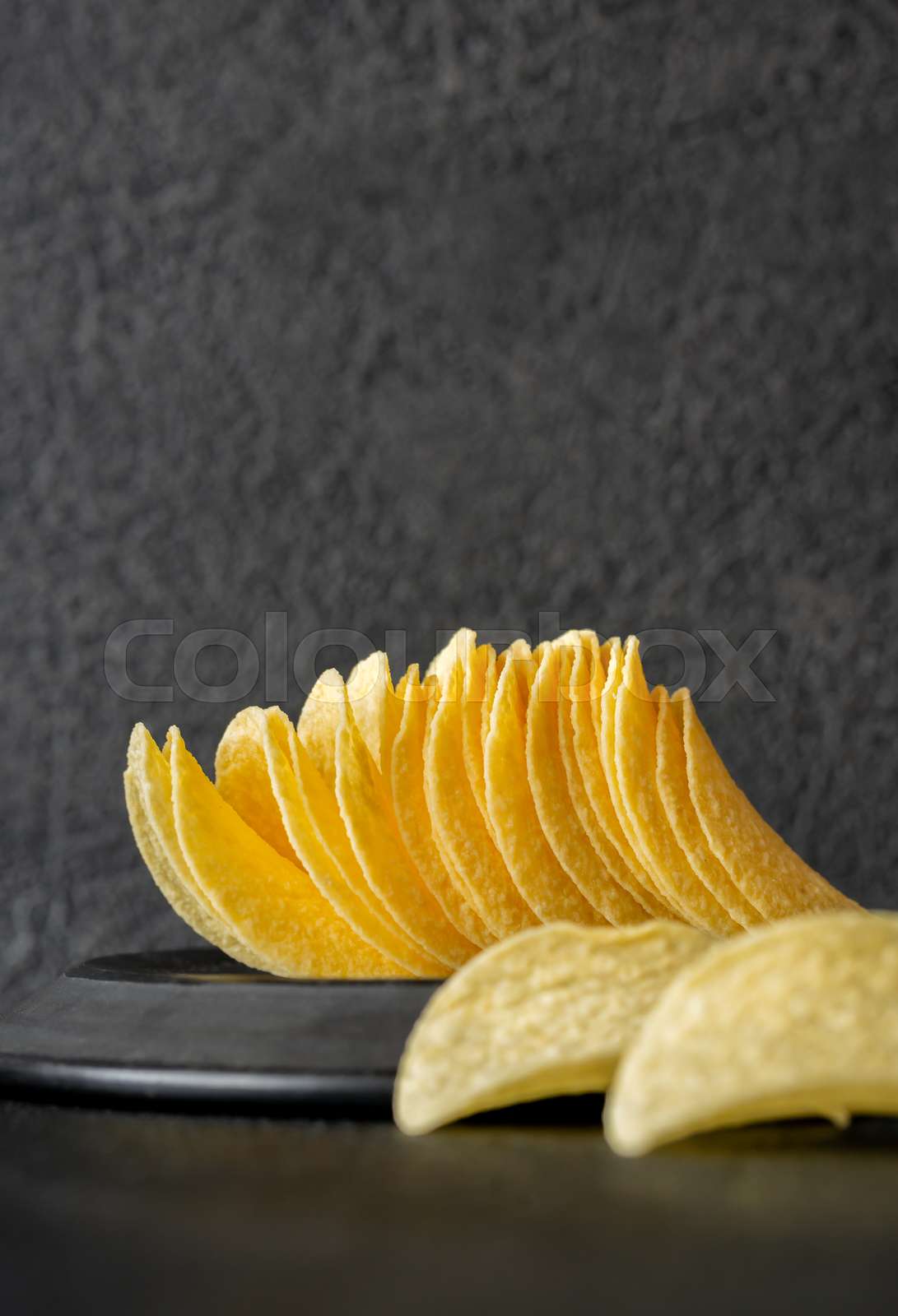 Potato chips on the plate | Stock image | Colourbox