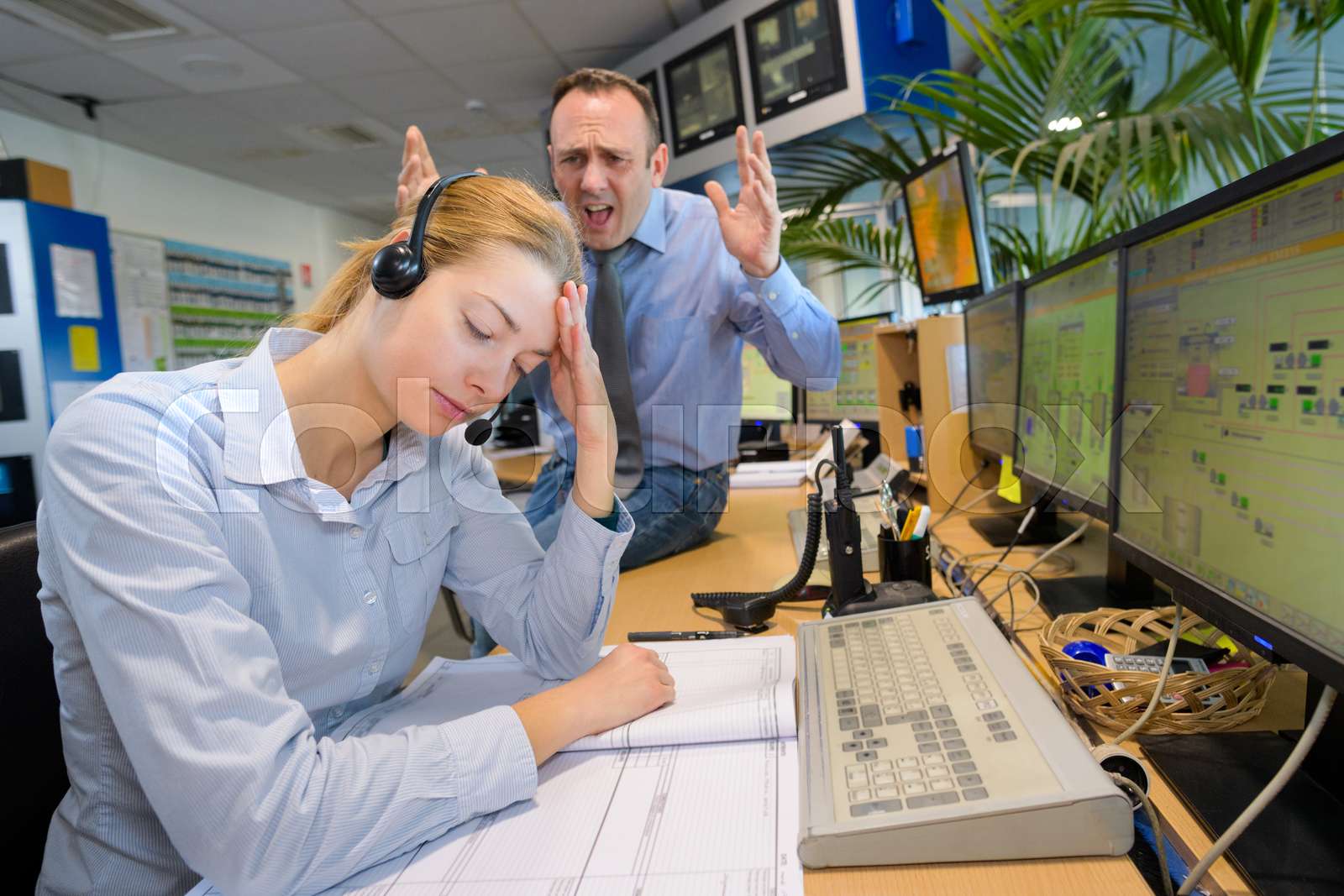 angry boss yelling at his employee in office | Stock image | Colourbox