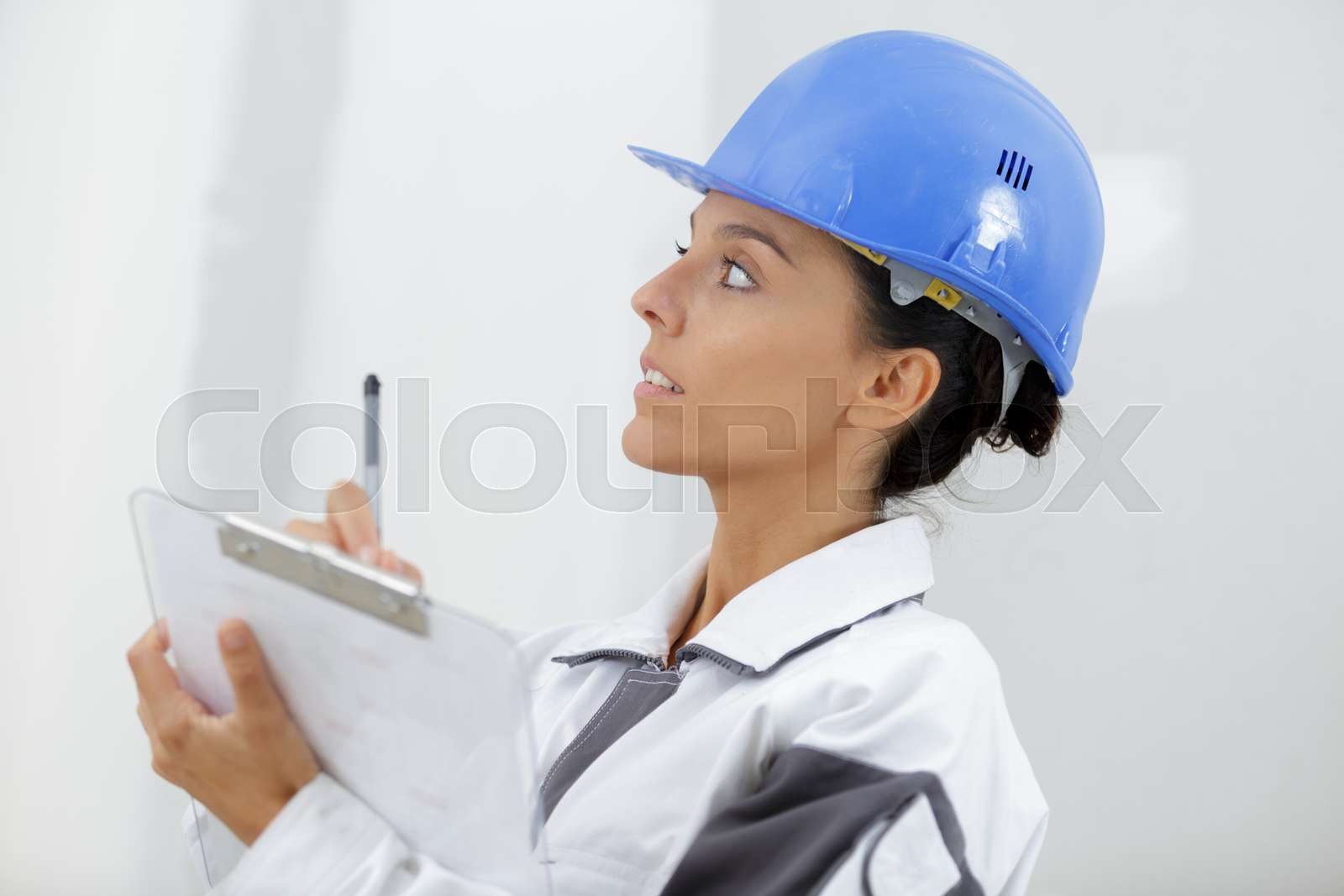 female inspector on construction site | Stock image | Colourbox