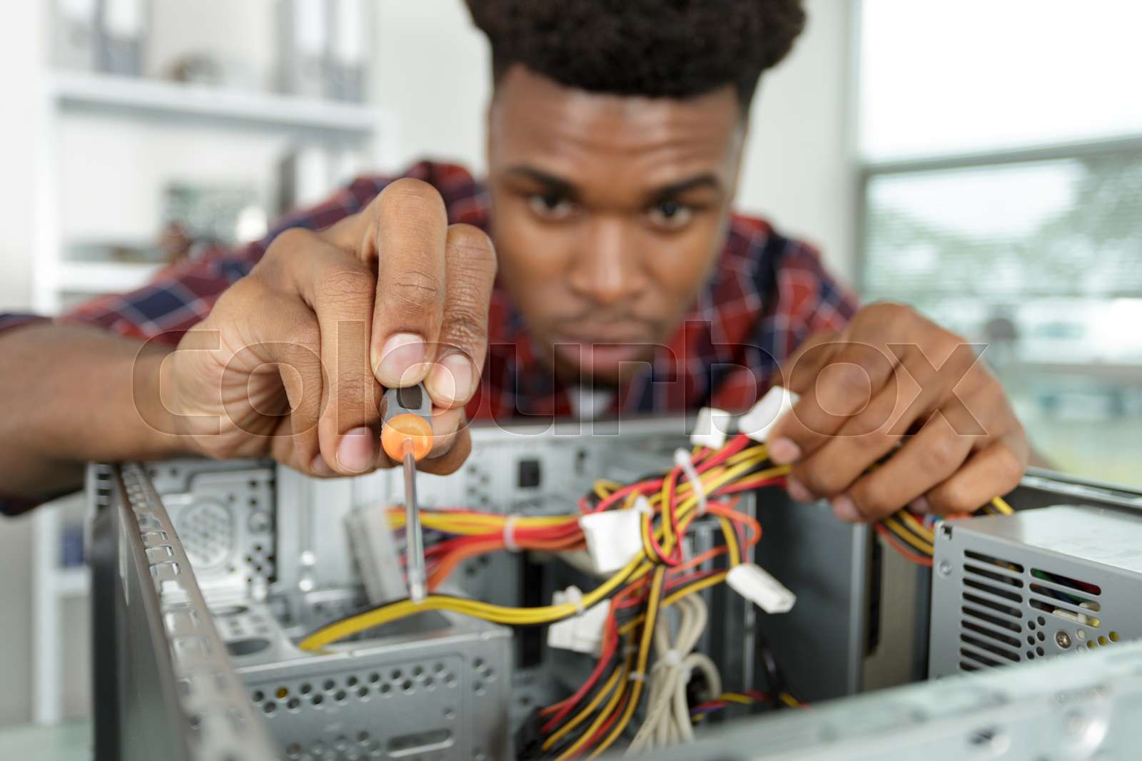 professional man repairing and assembling a computer | Stock image ...