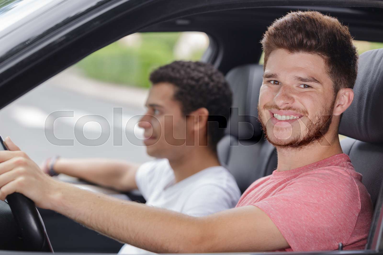 a happy boy in the car | Stock image | Colourbox