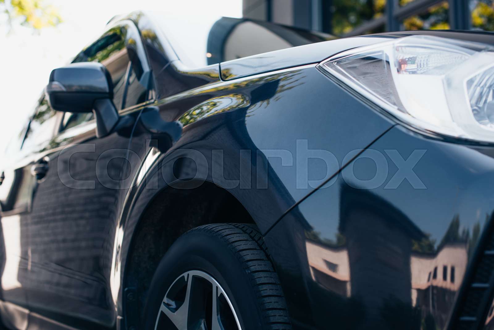 front and side of black, polished modern car | Stock image | Colourbox