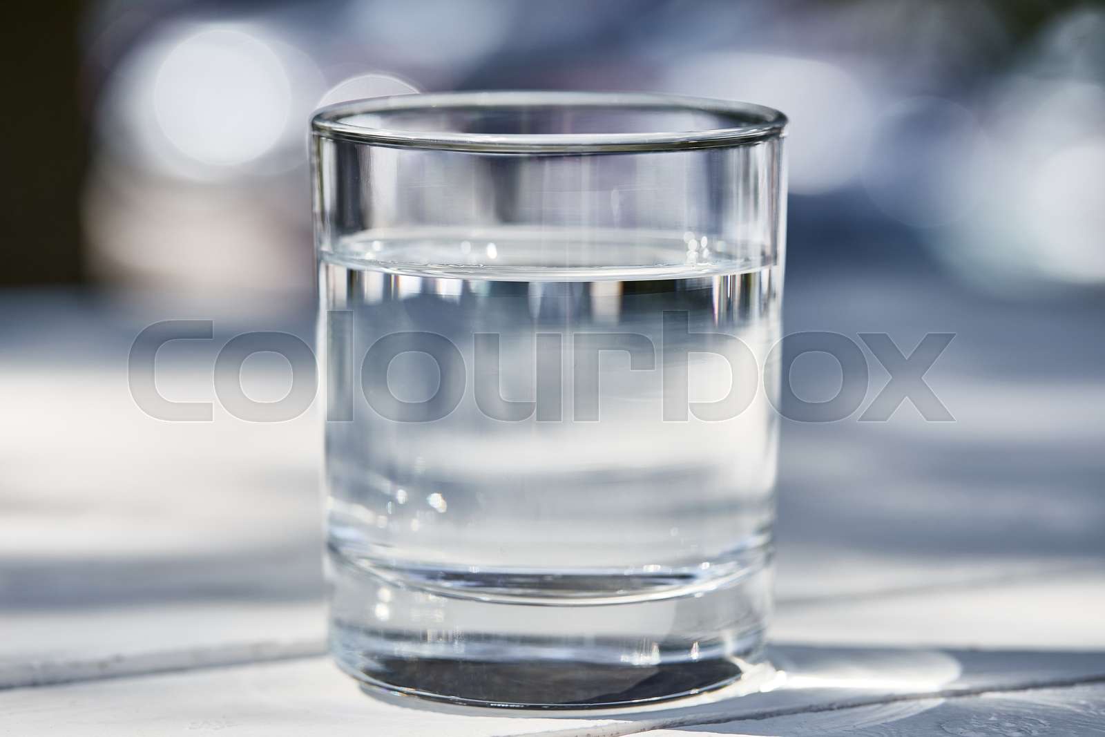 fresh clean water in transparent glass at sunny day outside | Stock ...
