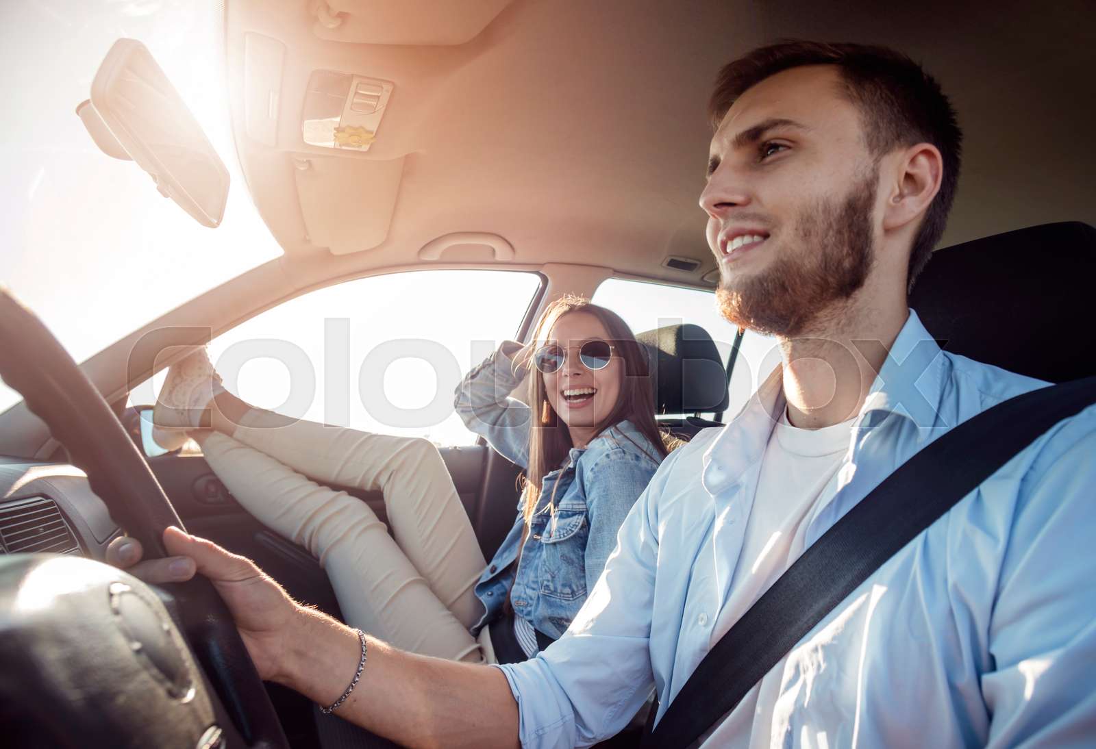 Beautiful Girl Relaxing While Boyfriend Driving a Car | Stock image ...