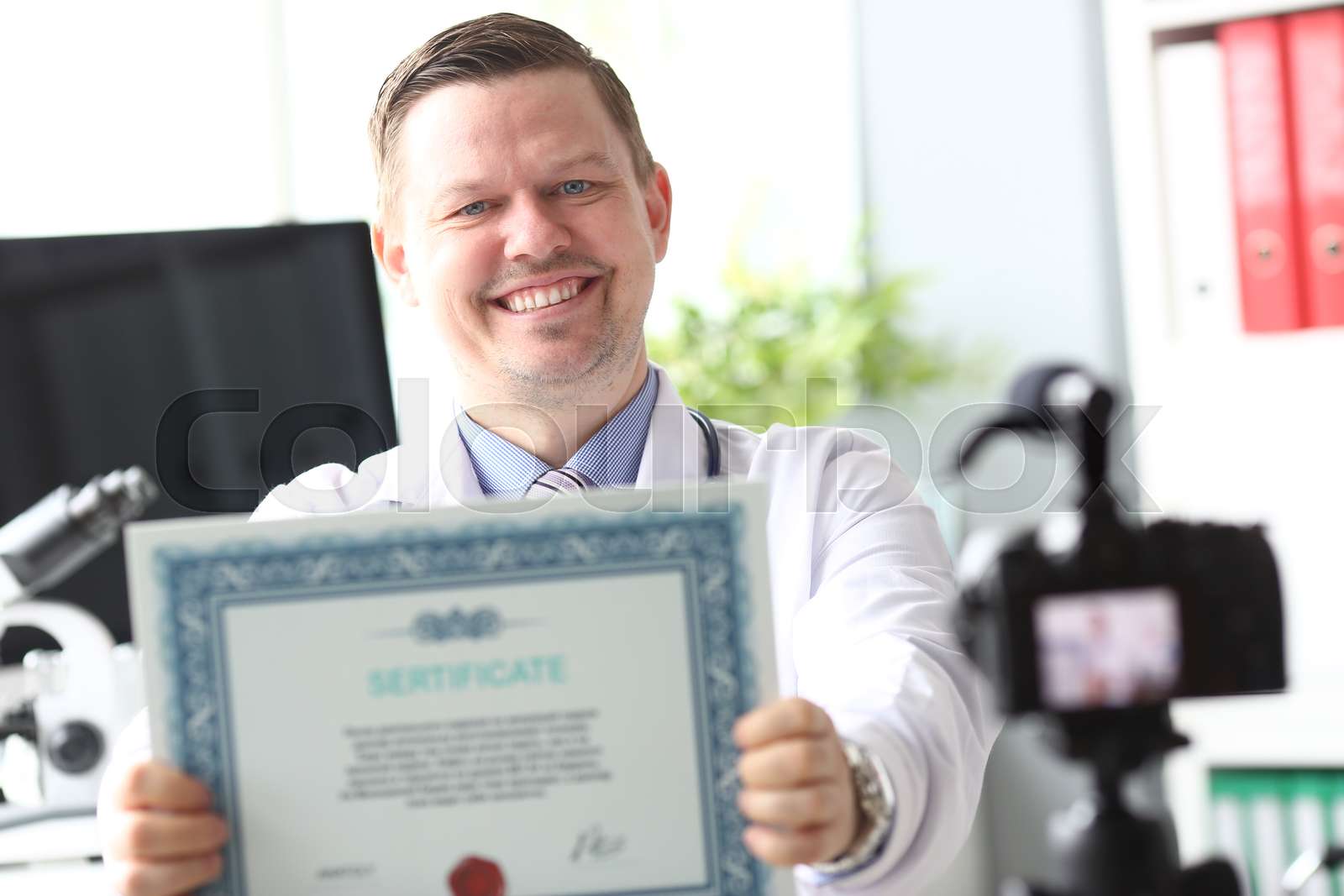 Proud smart doctor | Stock image | Colourbox