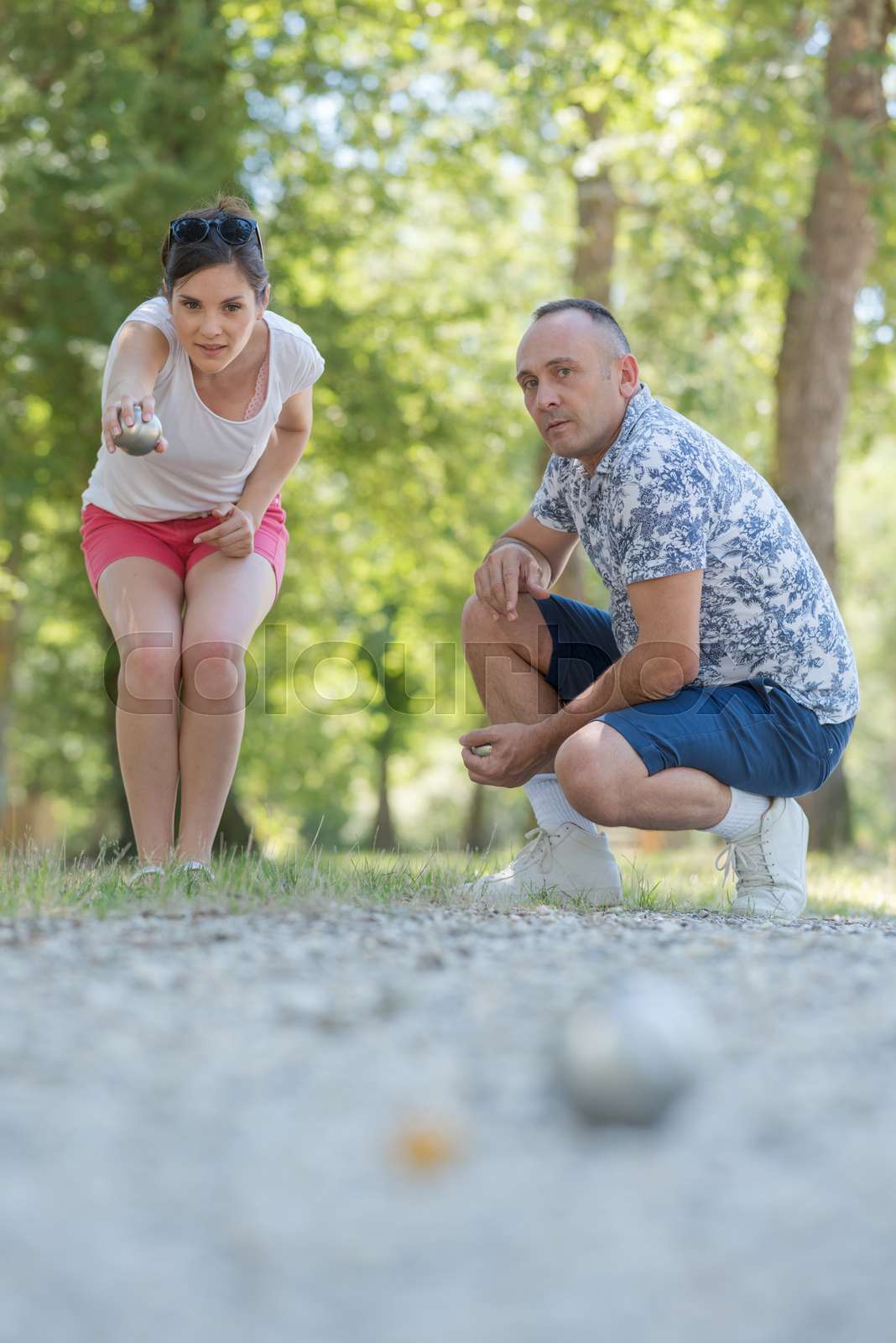 a couple playing the petanque | Stock image | Colourbox