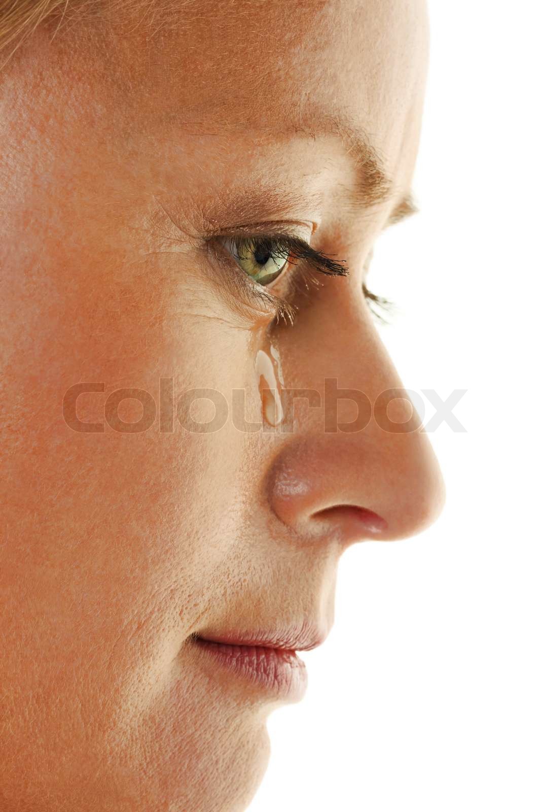 weeping, sad woman with tear | Stock image | Colourbox