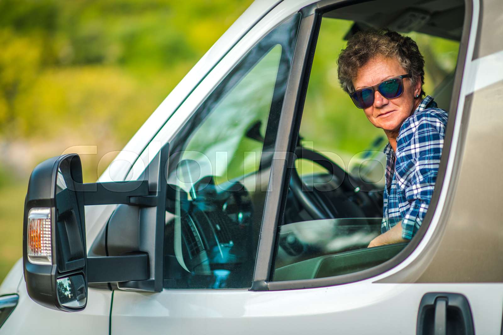 Woman Driving RV Camper | Stock image | Colourbox