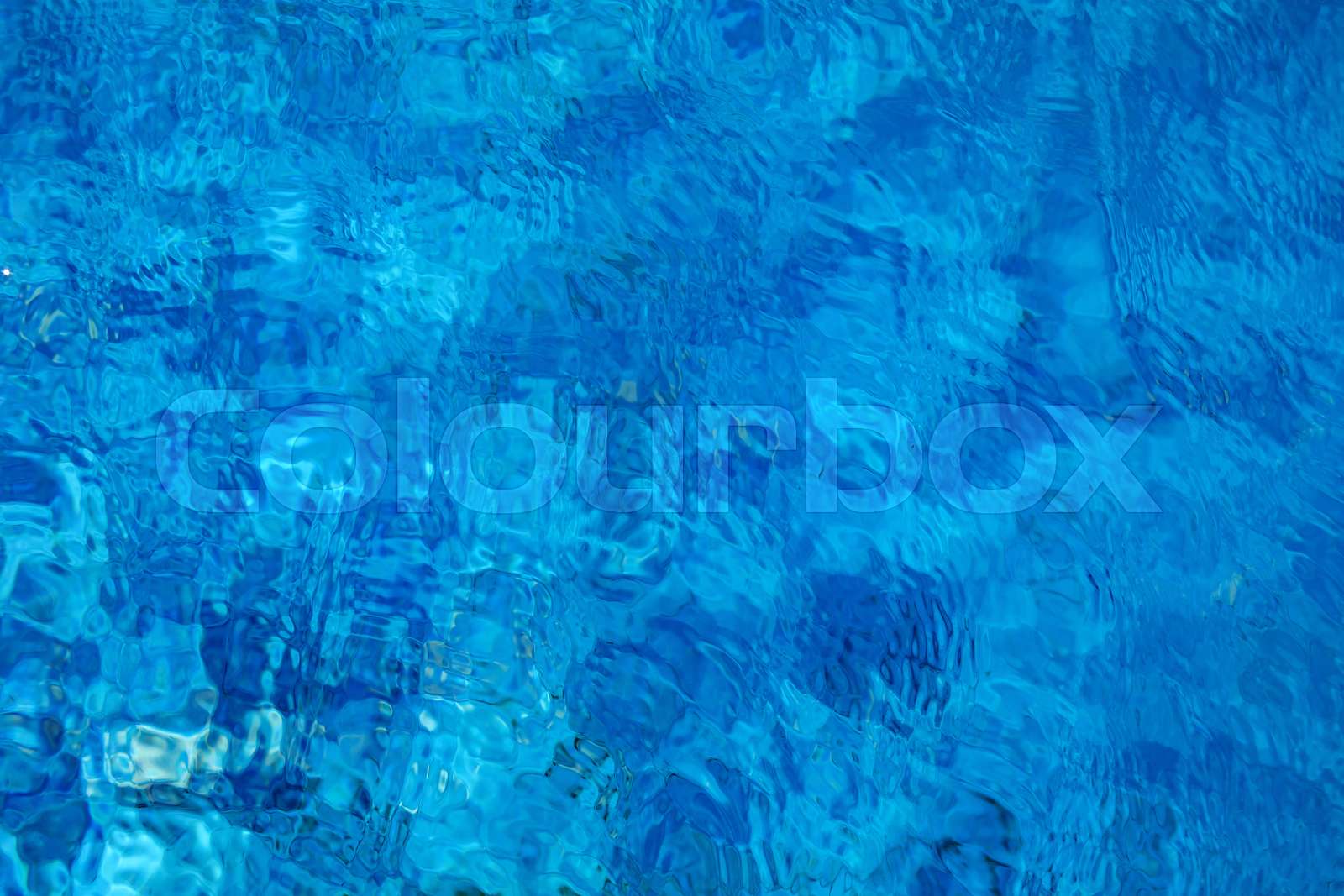 Clean water in a blue pool | Stock image | Colourbox