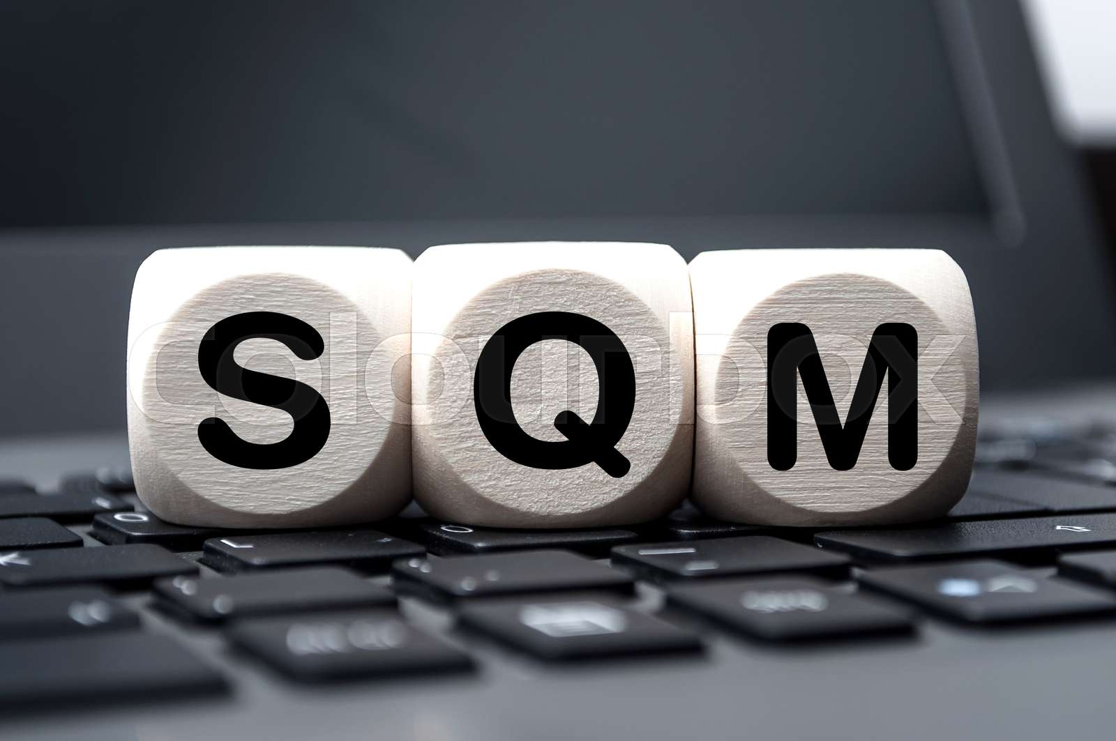 Cubes and dice with SQM Service Quality Management | Stock image ...