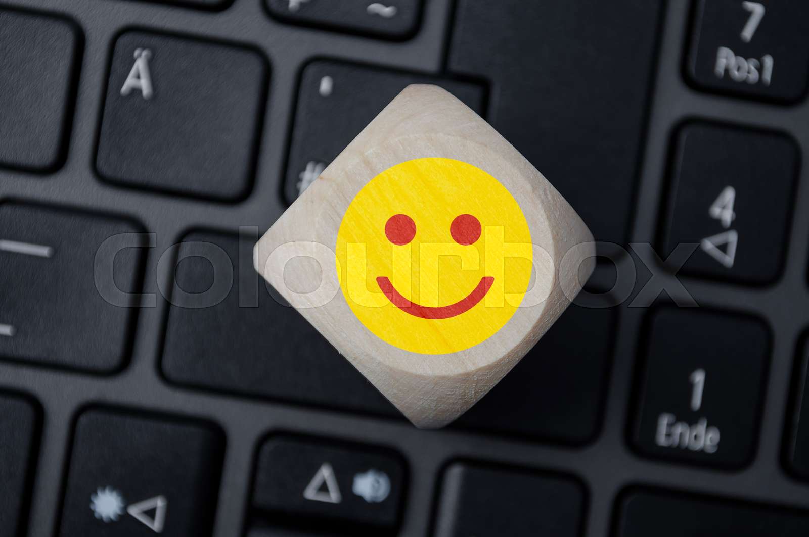 Emoticons on a keyboard, happy, unhappy | Stock image | Colourbox