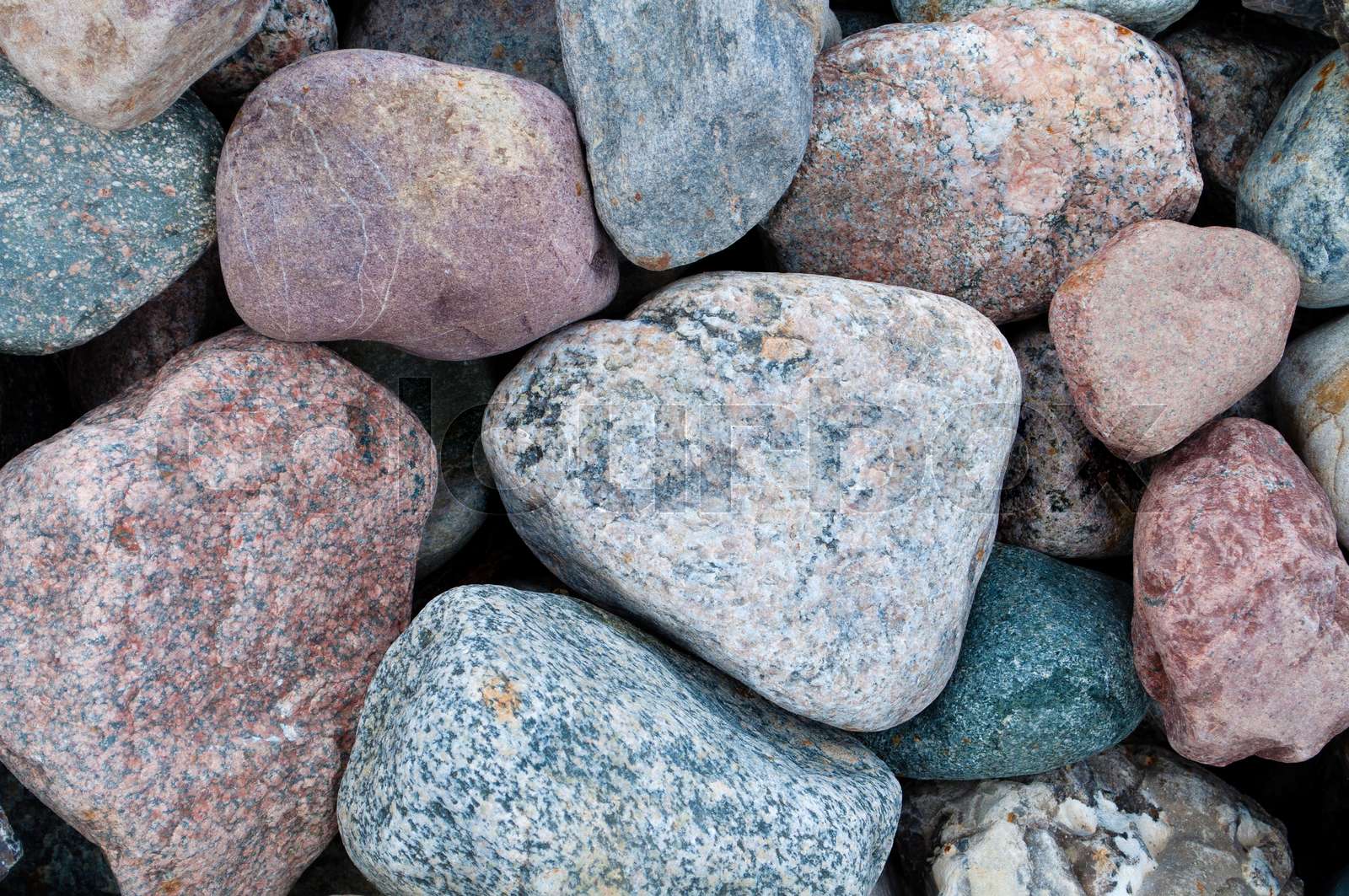 Different kinds of pebbles lying on the beach | Stock image | Colourbox