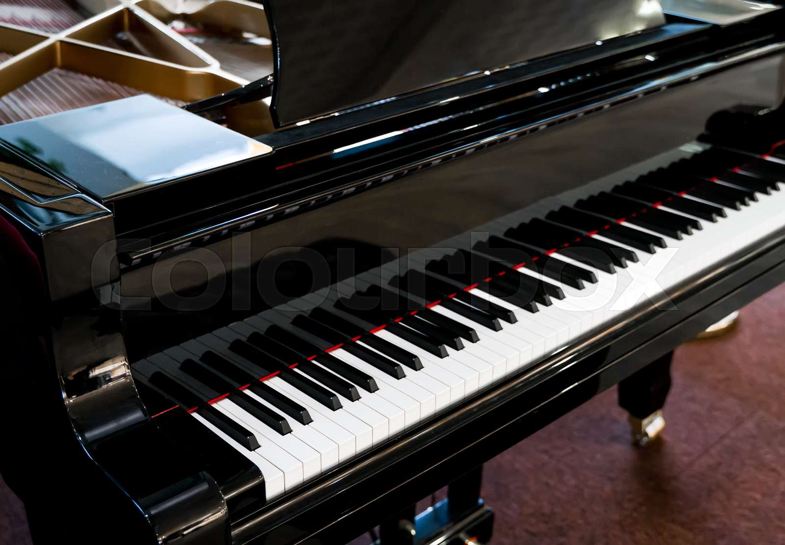 Close-up view of royal grand piano keys. | Stock image | Colourbox