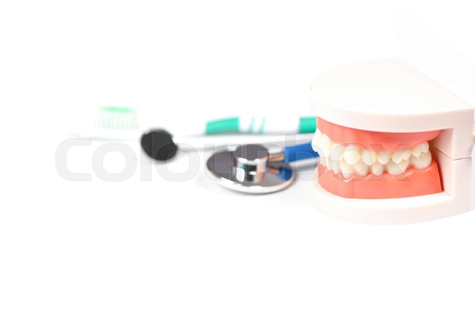 Dental care concept - dentist tools with dentures dentistry instruments ...