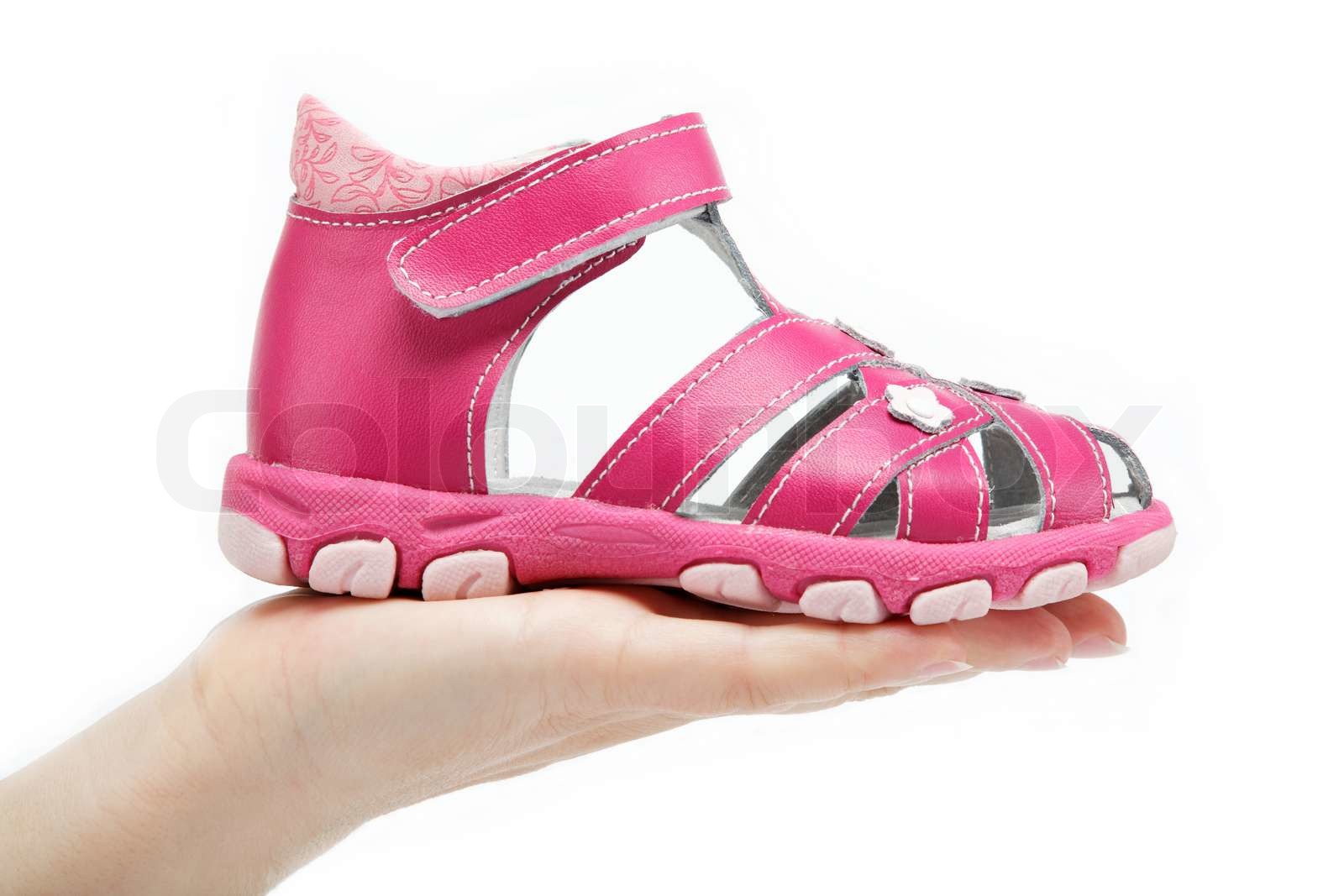pink child's sandals isolated on white | Stock image | Colourbox