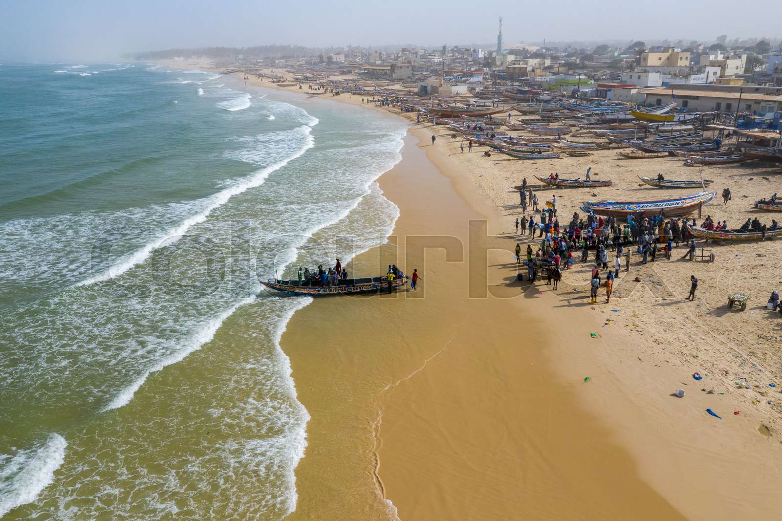 Aerial view of fishing village, pirogues fishing boats in Kayar ...