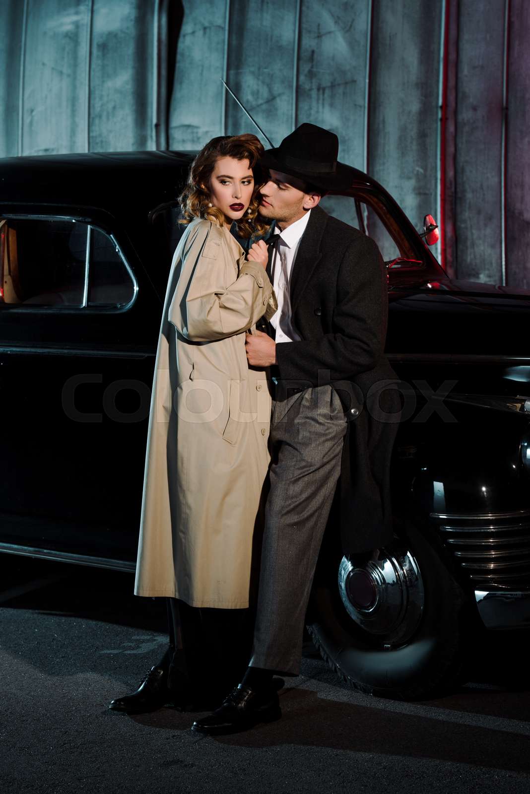 handsome gangsters standing near retro car outside | Stock image ...