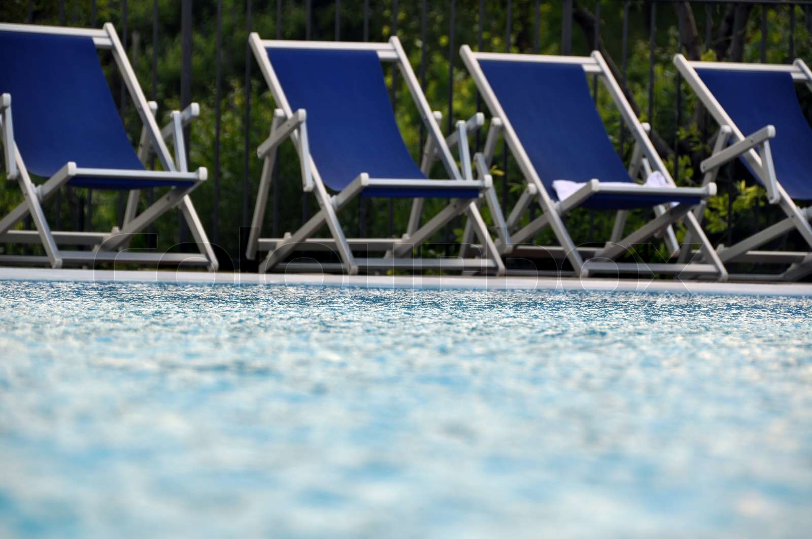 Swimming Pool chairs | Stock image | Colourbox