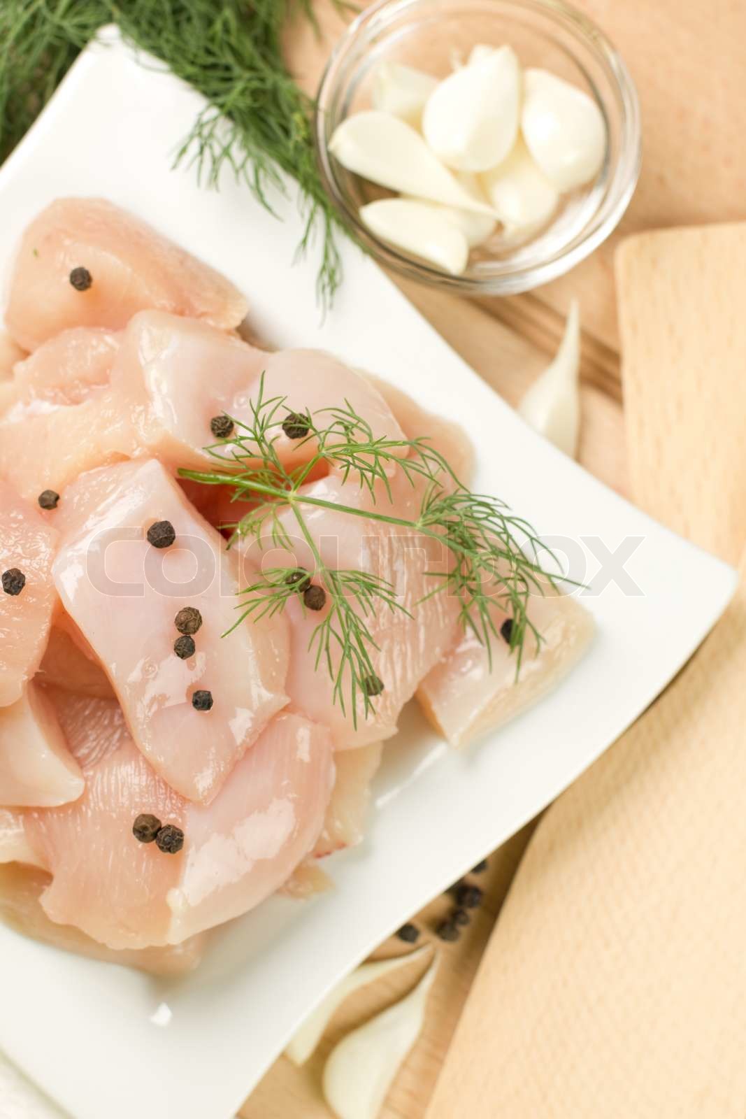 Preparation of raw chicken breast | Stock image | Colourbox
