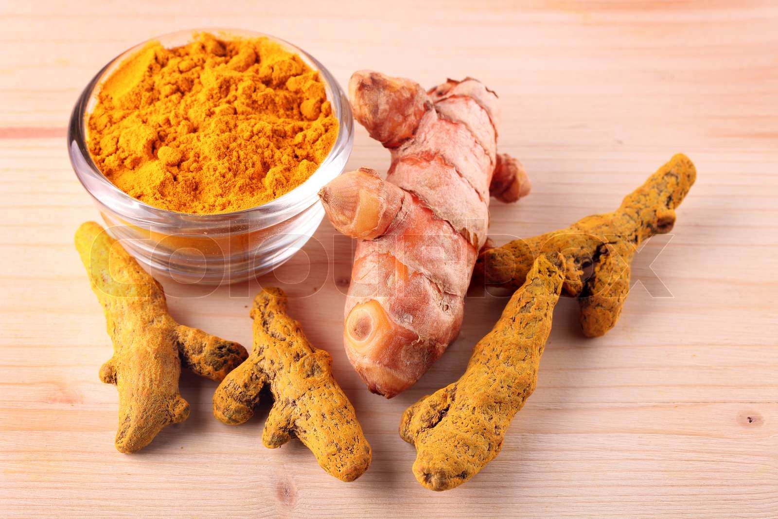 Fresh, dried and powdered turmeric root | Stock image | Colourbox
