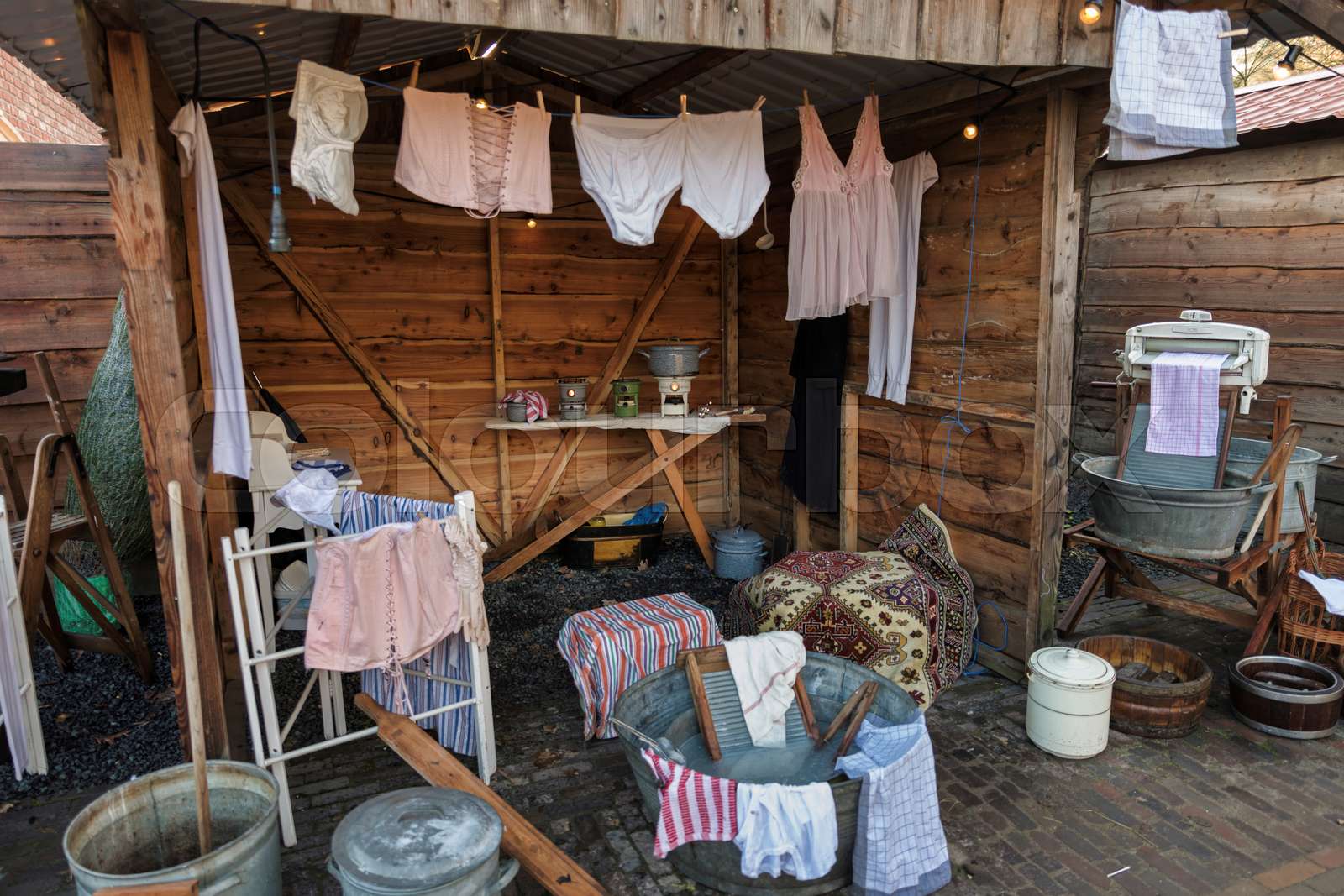 vintage way of washing clothes outdoor | Stock image | Colourbox
