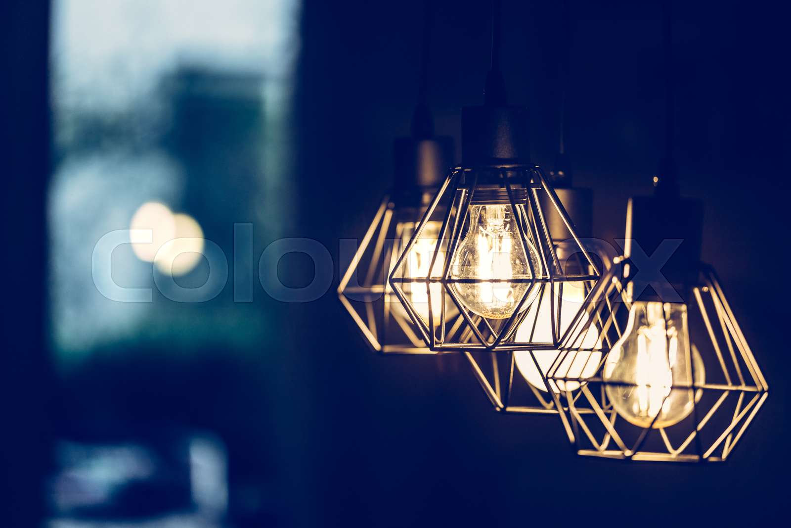 Lightning lamps at home, in restaurant or cafe: Close up of a hanging ...
