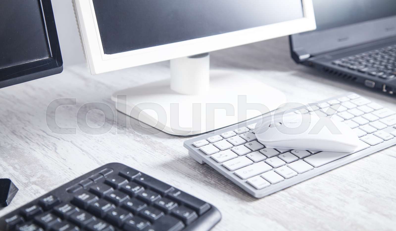 Workspace with computers. Desk work concept | Stock image | Colourbox
