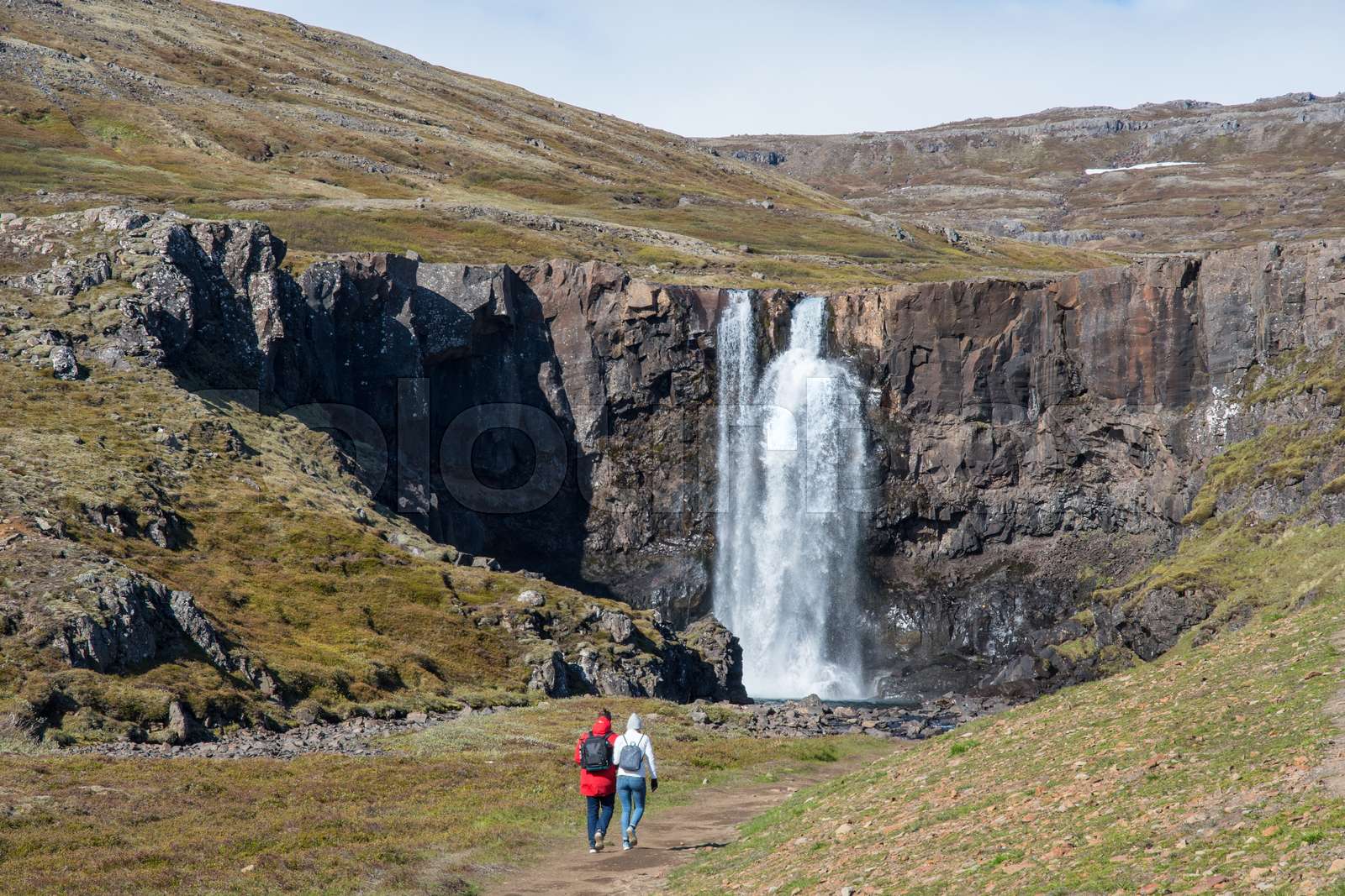 Waterfall gufufoss in river Fjardara in Seydisfjordur in east Iceland ...