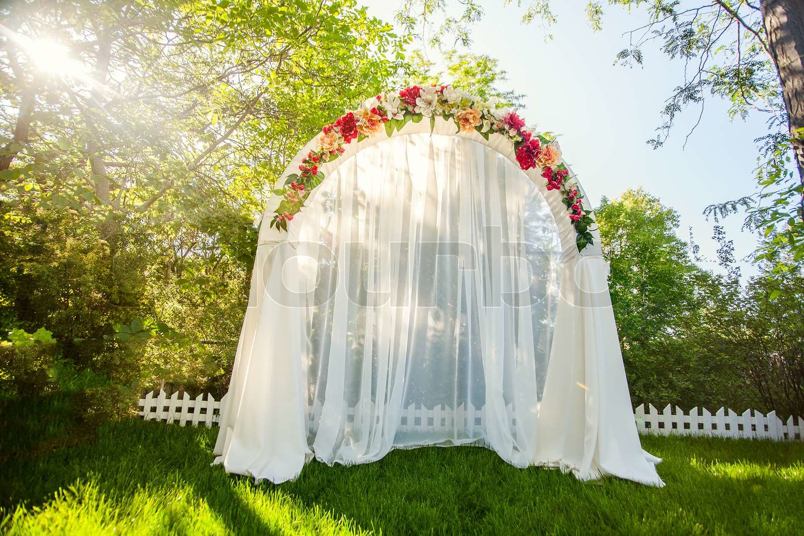 Wedding Arch on the grass | Stock image | Colourbox