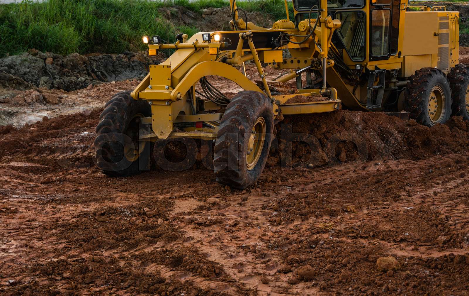 Grader is working on road construction. Grader industrial machine on ...