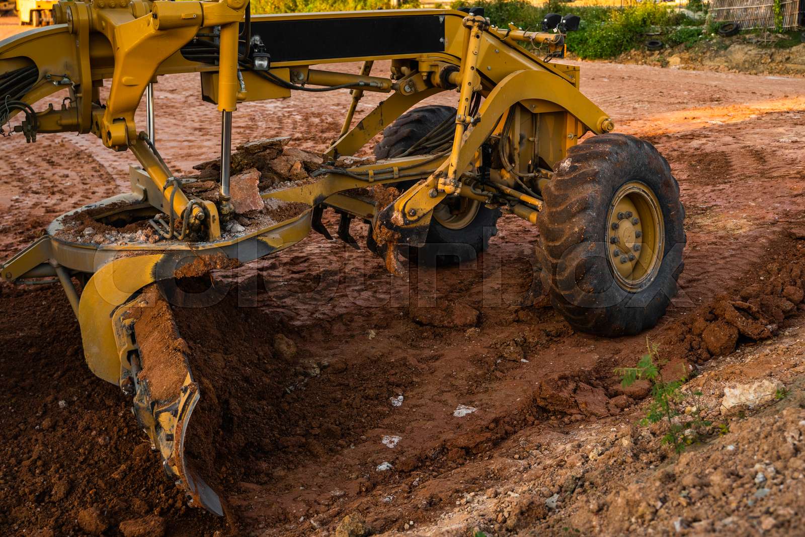 Grader is working on road construction. Grader industrial machine on ...