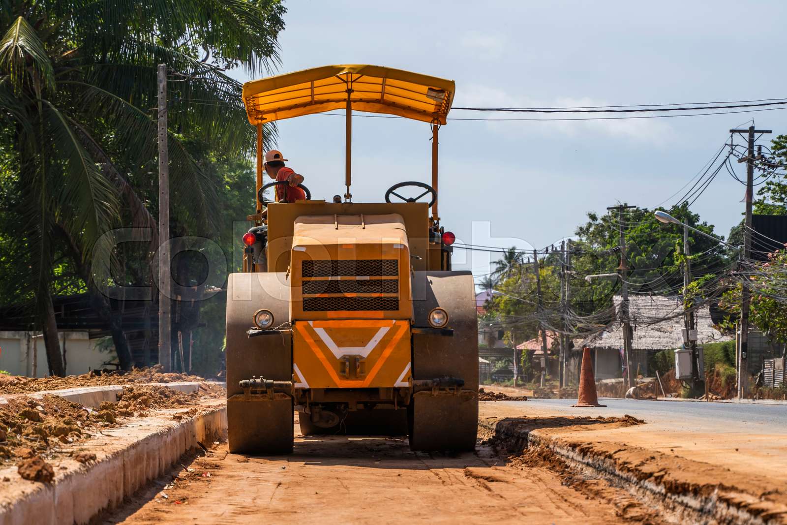 Road rollers working on the new roads construction site. Heavy duty ...