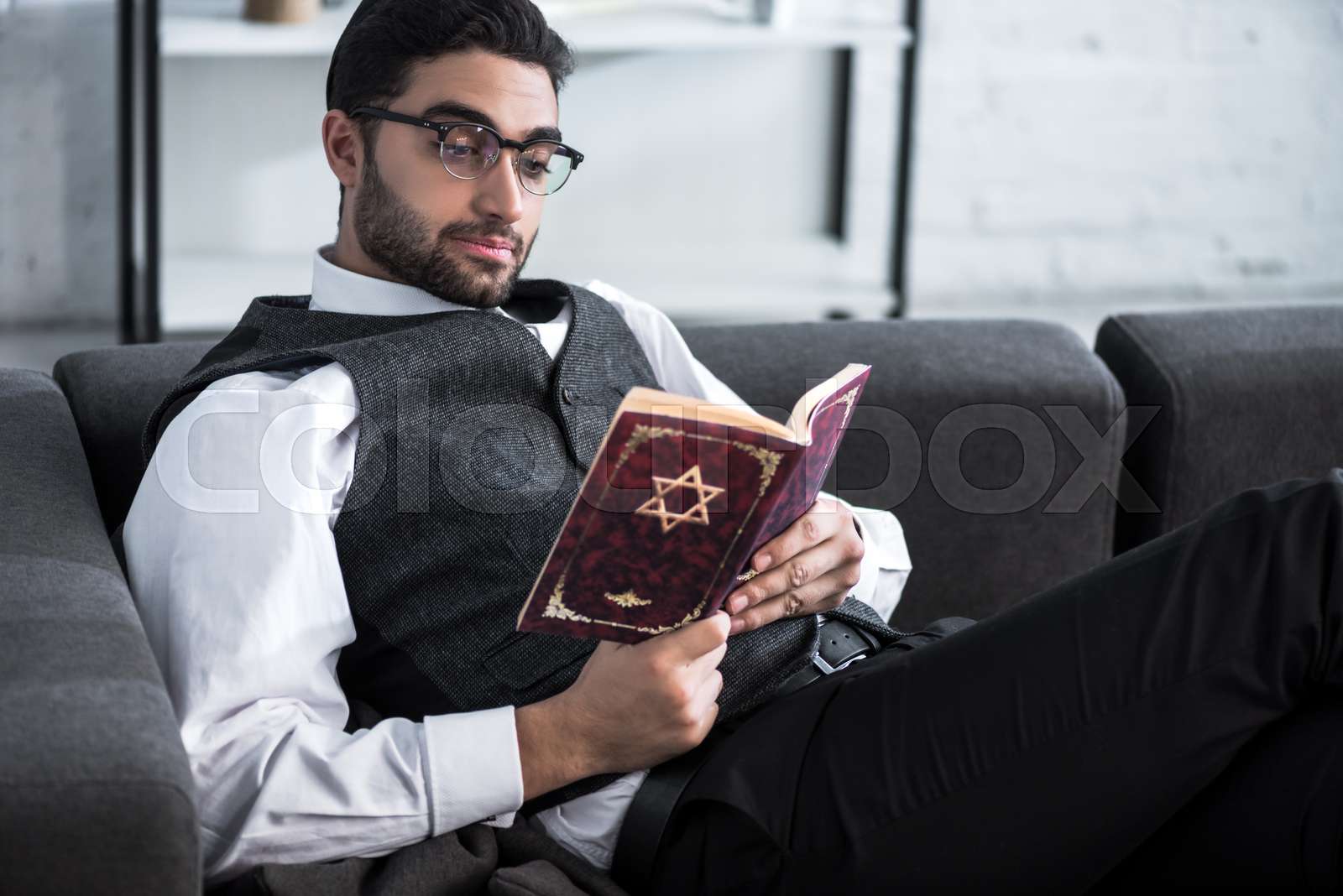 handsome and young jewish man in glasses reading tanakh | Stock image ...