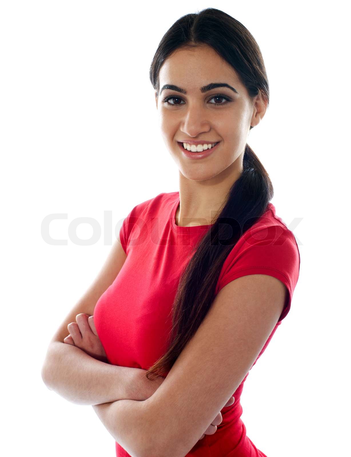 Pretty girl posing arms crossed | Stock image | Colourbox