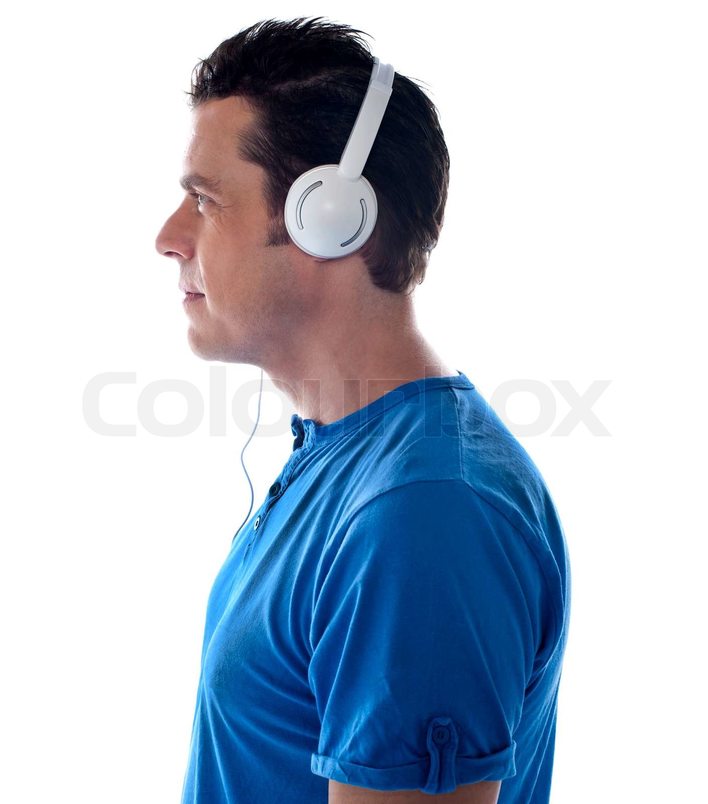Side pose of a man with headphones | Stock image | Colourbox