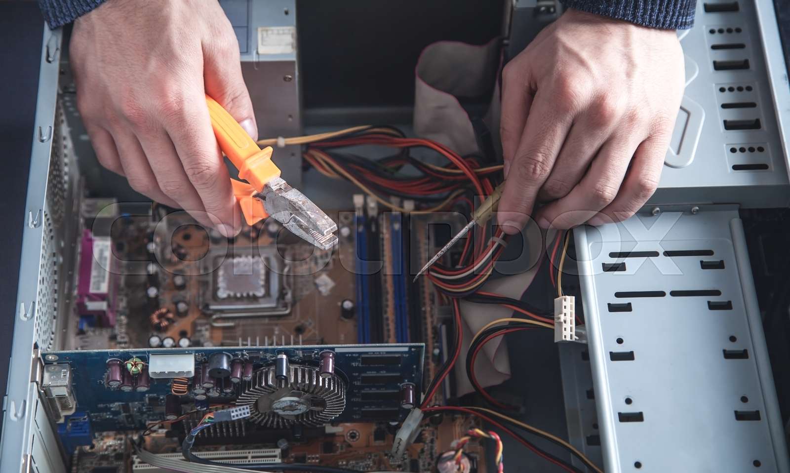 Repairman trying to repair computer. Repair, Service | Stock image ...