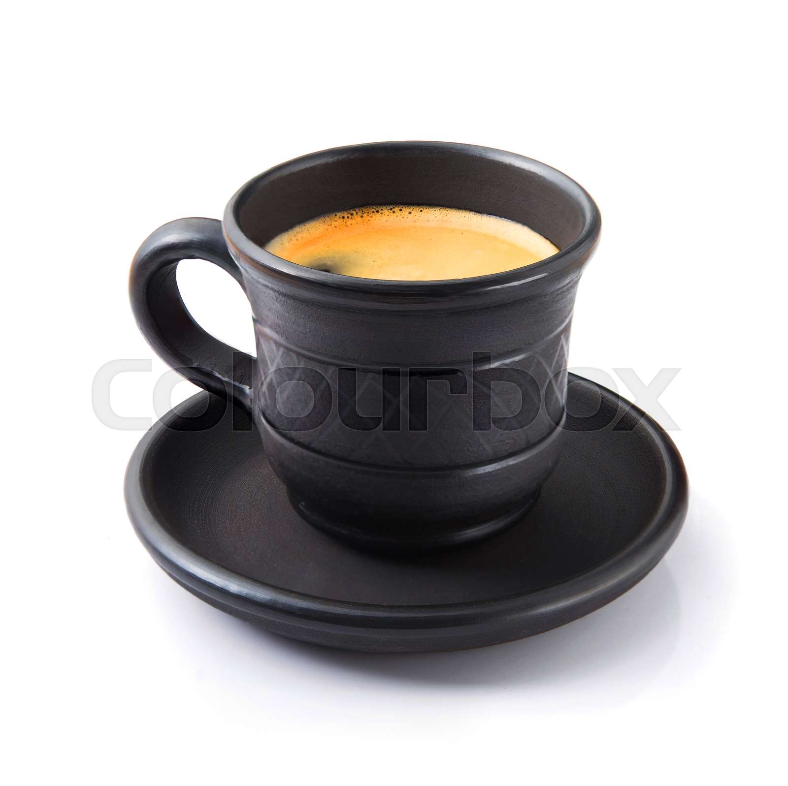 Espresso coffee in a black cup isolated | Stock image | Colourbox