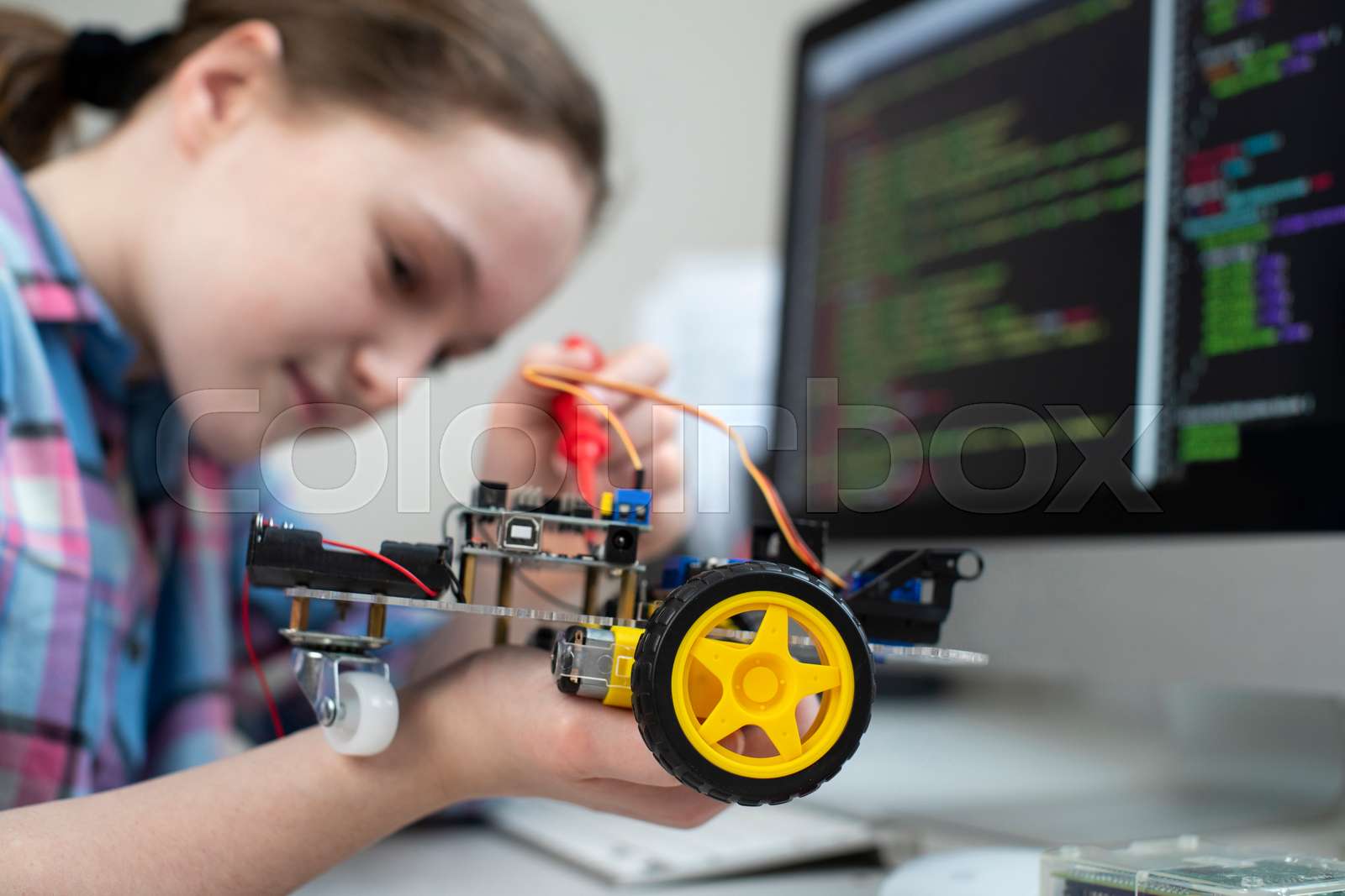 Female Pupil Building Robot Car In School Science Lesson | Stock image ...