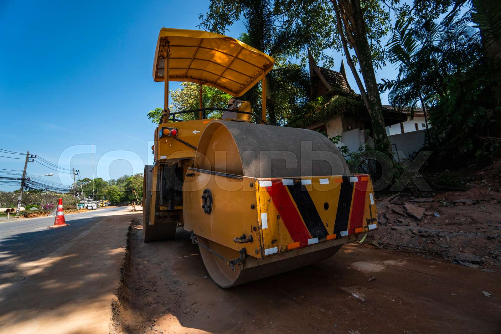 Road rollers working on the new roads construction site. Heavy duty ...