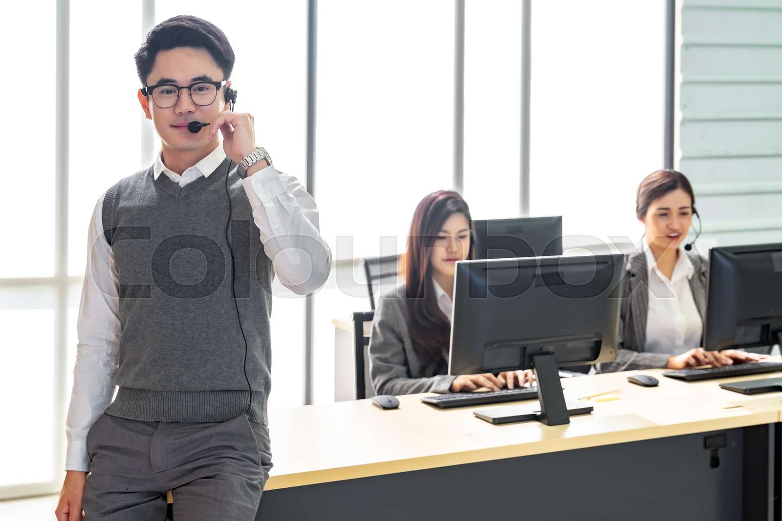 Smiling call Center team | Stock image | Colourbox