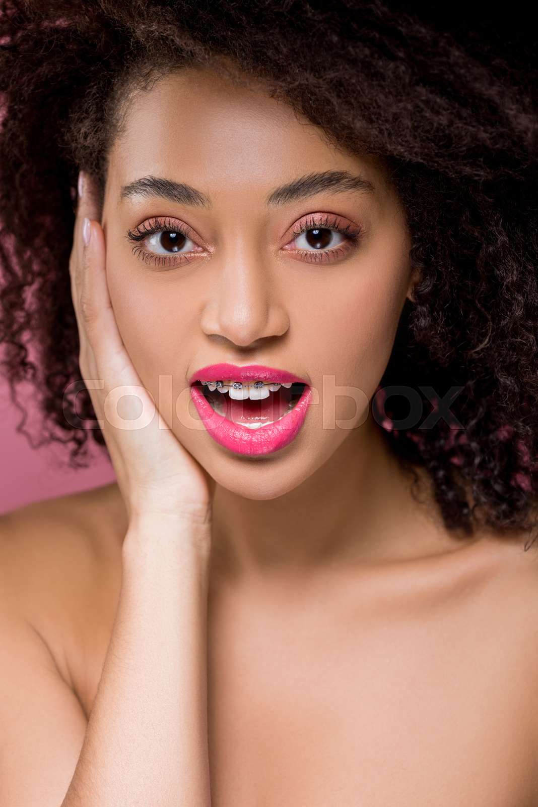 Surprised Naked African American Girl With Dental Braces Isolated On