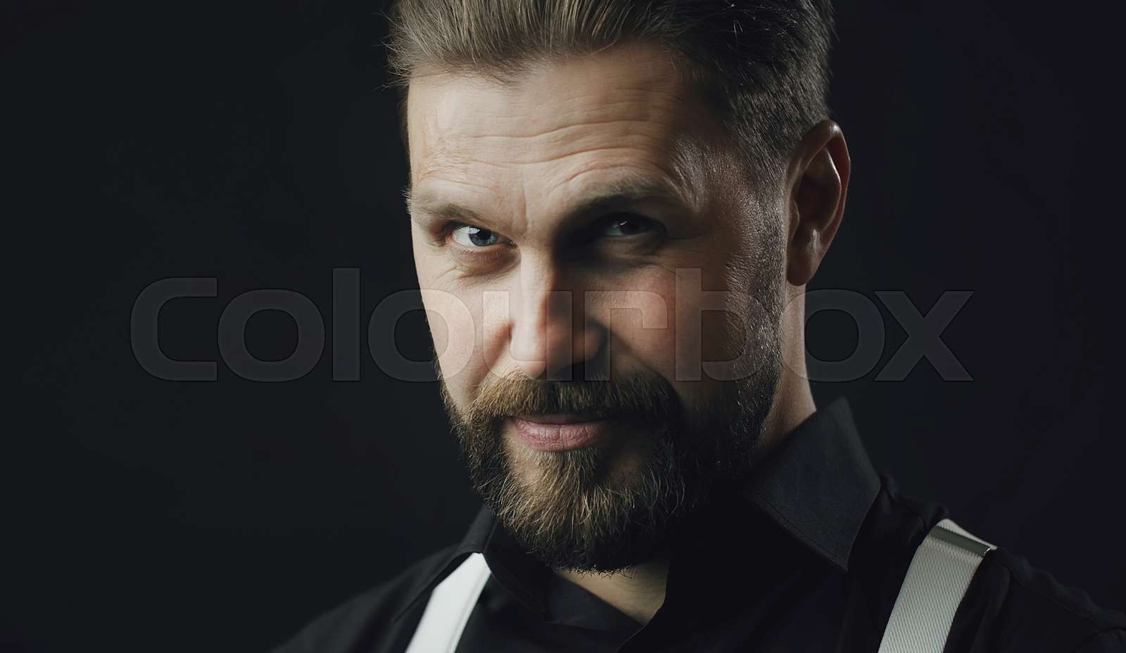 Mysterious-looking guy portrait | Stock image | Colourbox