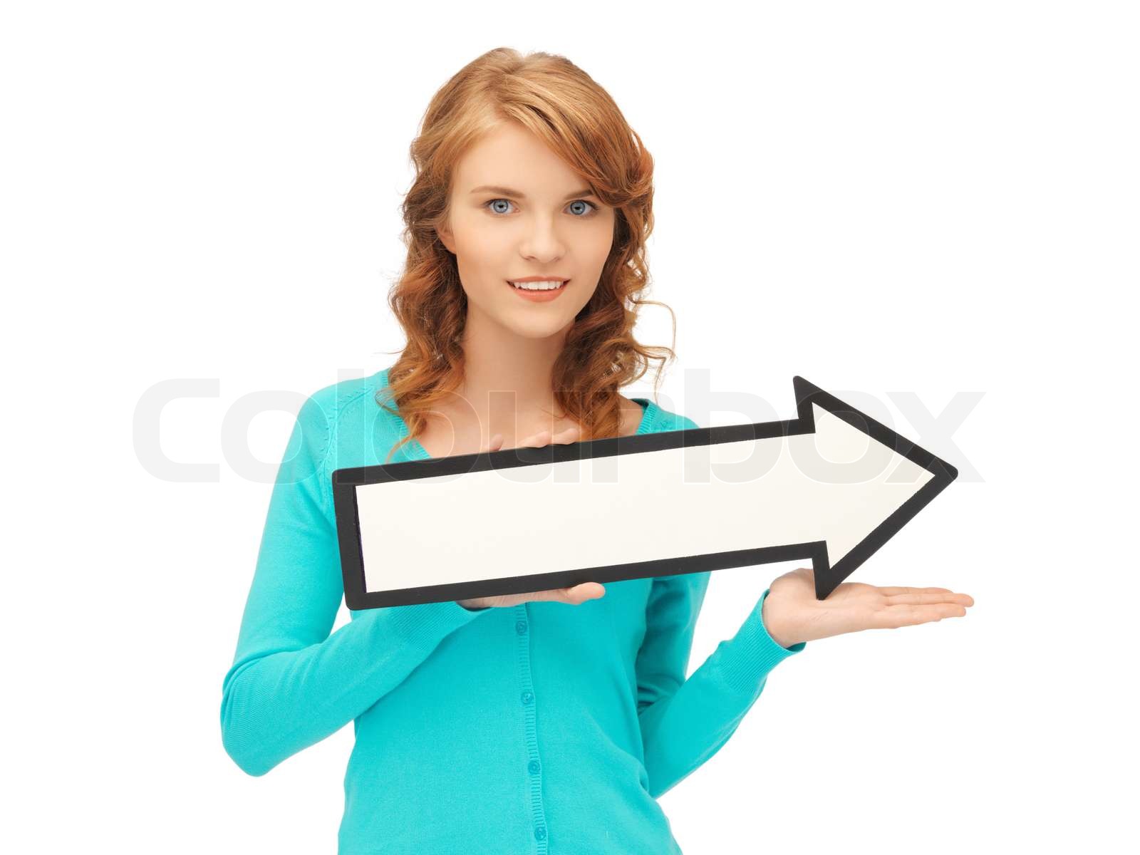 teenage girl with direction arrow sign | Stock image | Colourbox