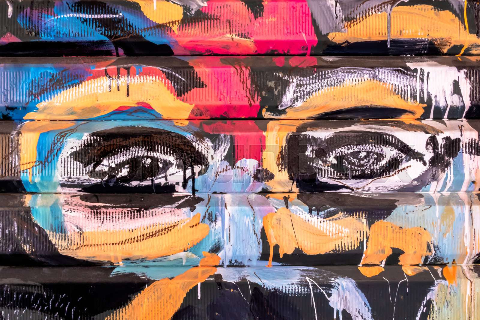 Colorful human face on graffiti artwork | Stock image | Colourbox