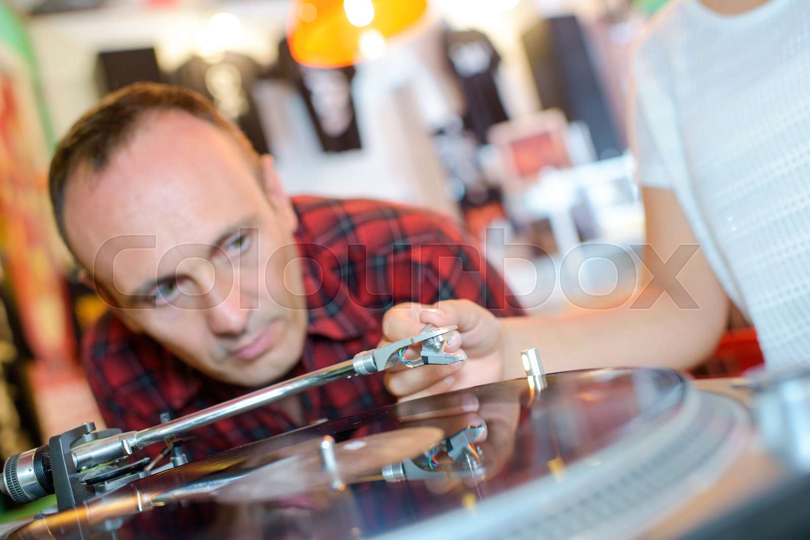 a man with record player | Stock image | Colourbox
