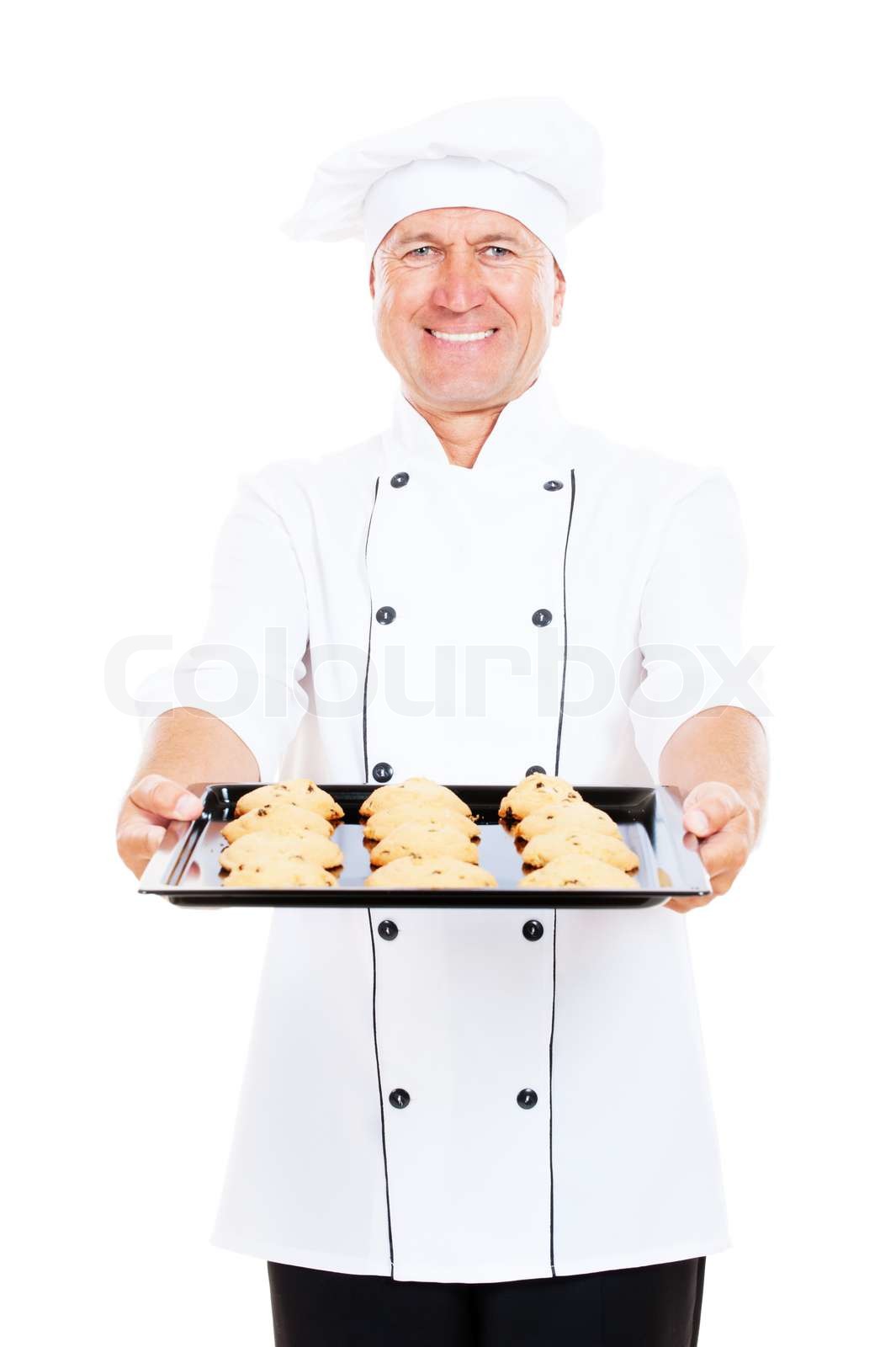 smiley cook with cookies | Stock image | Colourbox